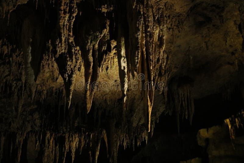 Picturesque View of Many Stalactite Formations in Dark Cave Stock Image ...
