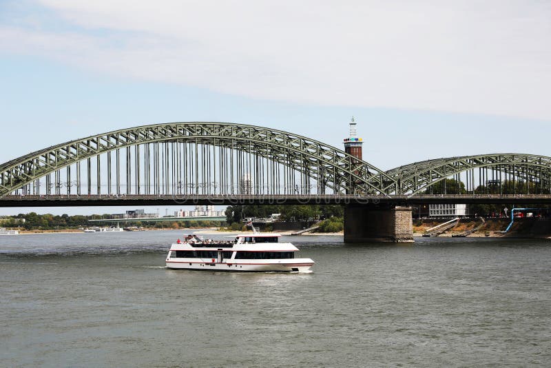 Picturesque View of a Modern Bridge Over River and Ferry Boat Editorial ...