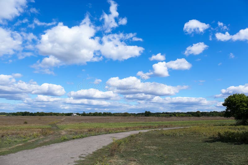 Picturesque View of Pathway in Field Above Cloudy Sky Stock Photo ...