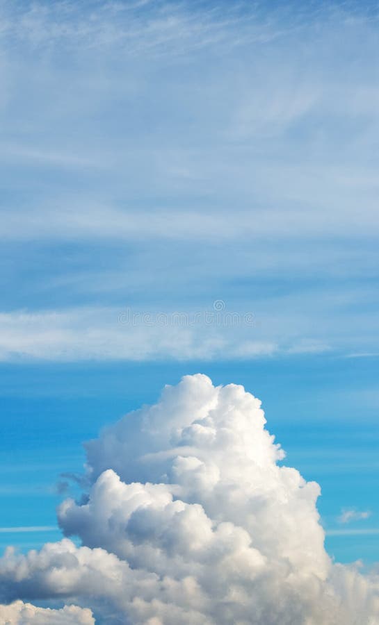 Picturesque White Curly Cloud in Blue Sky, Vertical Format Stock Image ...