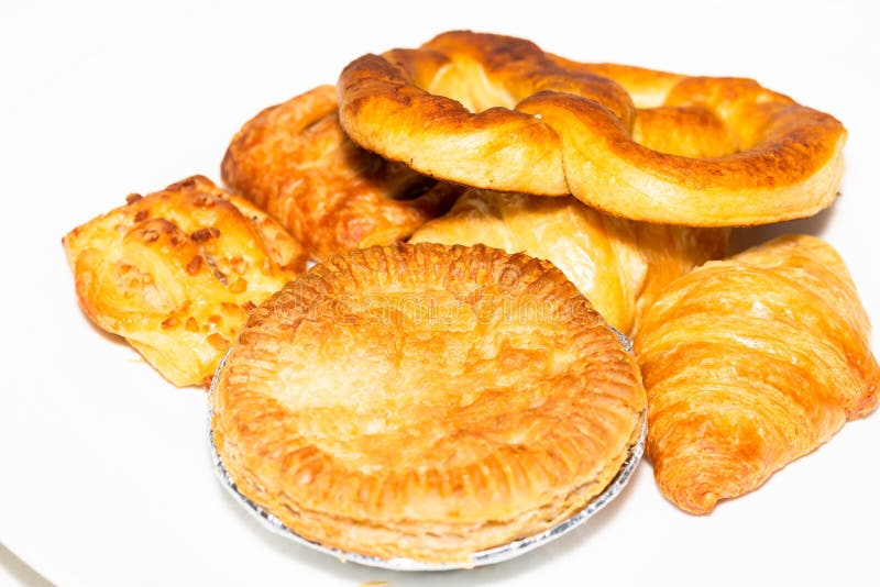 Pie and Pastries on White Plate Stock Photo - Image of catering, gold ...