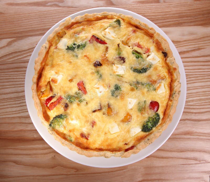 Pie with Cheese and Vegetables - Top View on a Wooden Table Stock Photo ...