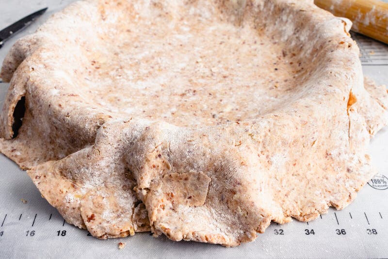 Rolled Out Pecan Shortbread Pie Crust Draped Over a Pie Pan Close-up ...