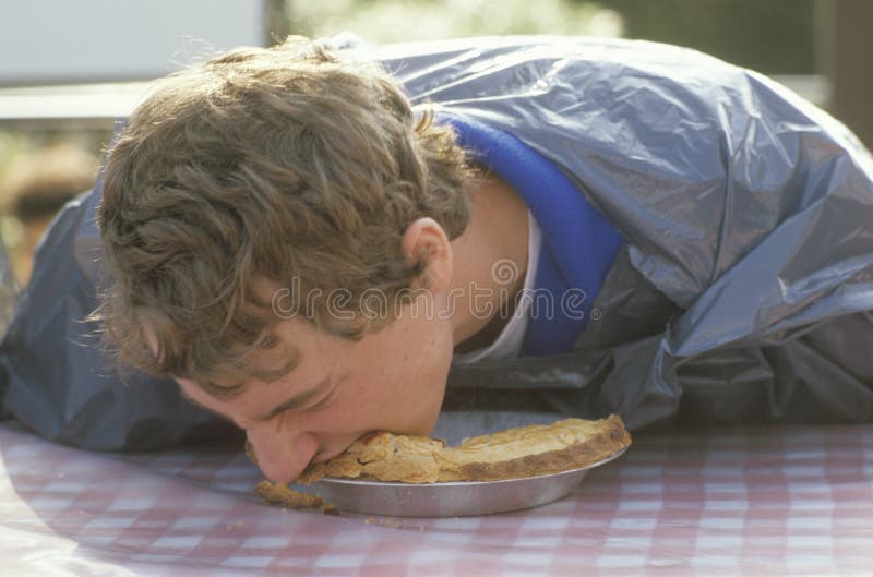 Pie-eating contest, editorial stock photo. Image of foods - 23179658
