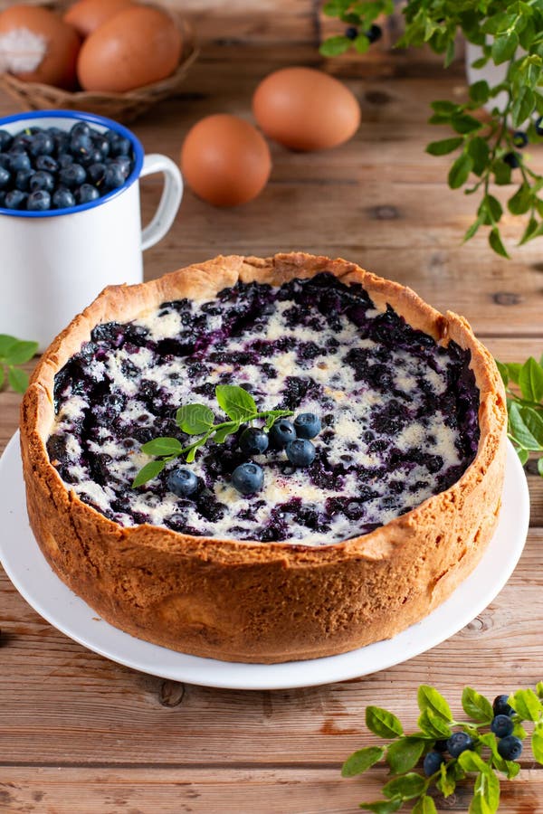 Pie with Fresh and Cooked Blueberries on Wooden Table Stock Image ...