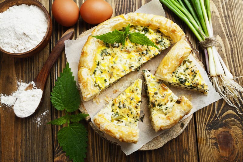Pie with Nettles and Spring Onion Stock Image - Image of glass, round ...