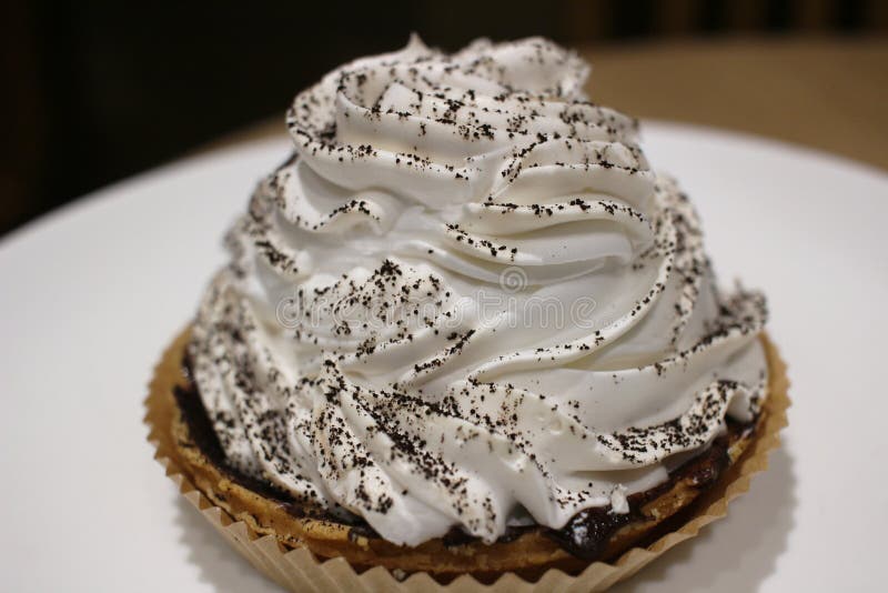 Pie Slice with Cream on Top on a Plate Stock Photo - Image of table ...