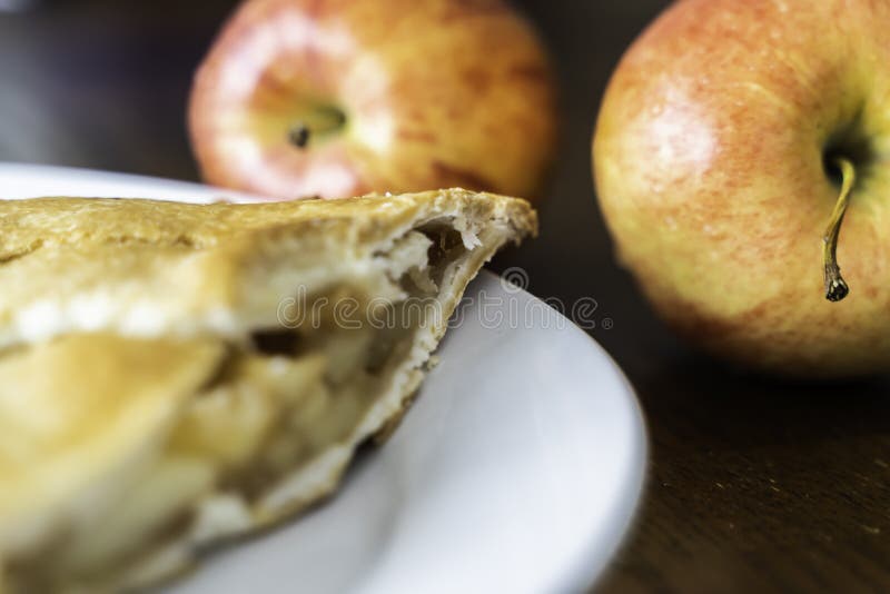 Piece of Apple Pie with Cracked Crust and Apples Stock Photo - Image of ...