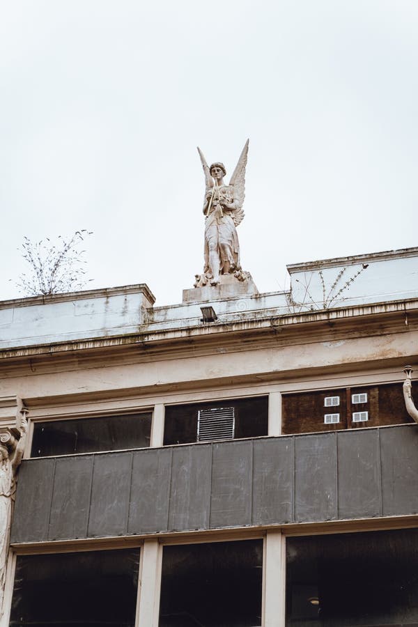 An Angle Statue on Top of a Building Editorial Stock Image - Image of ...
