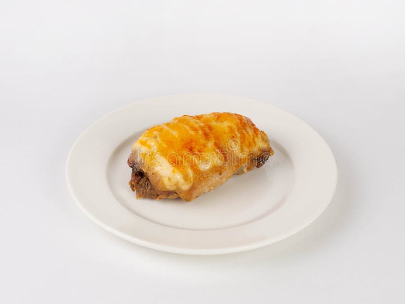 Appetizing Piece of Baked Duck with Cheese on a White Plate Stock Photo ...