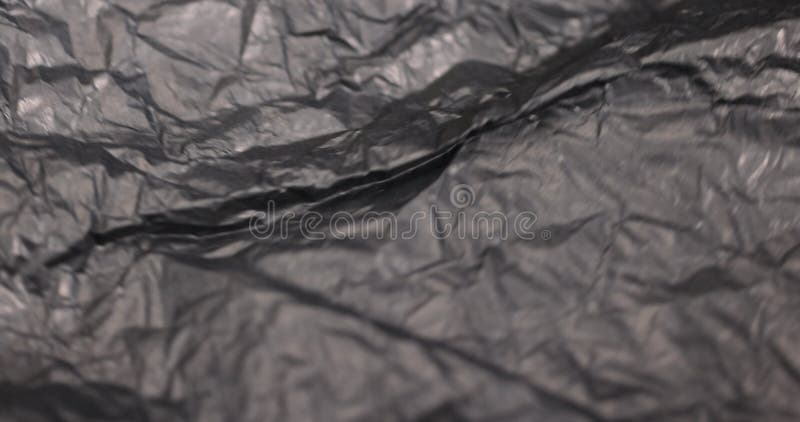 A Piece of Black Soft Paper for Packaging Goods and Objects Stock ...