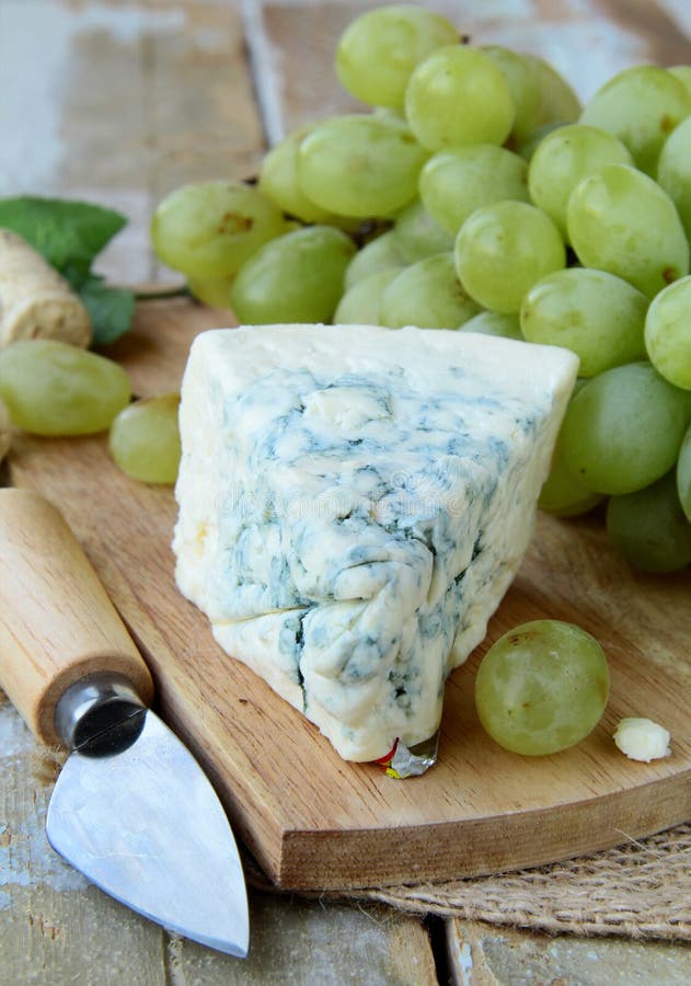 Piece of Blue Cheese, Grapes and Knife Stock Image - Image of ...