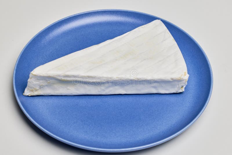 A piece of Brie cheese stock photo. Image of wooden - 364163574