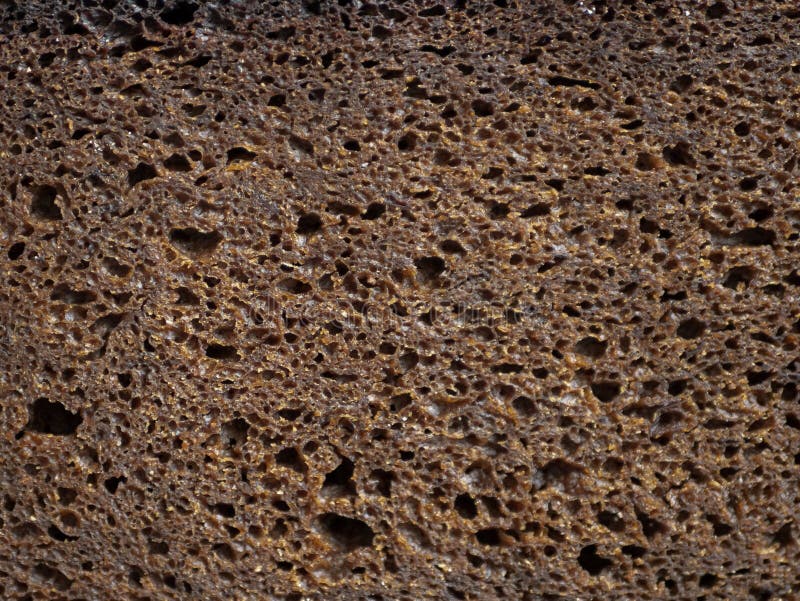 Piece of Brown Rye Bread. Bread Slice Texture Background Stock Photo ...