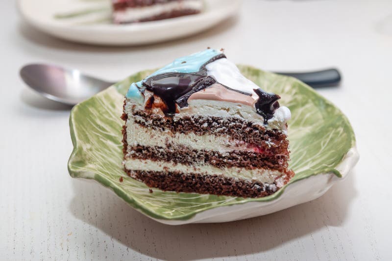 Piece of cake with cream stock image. Image of dark - 197246263