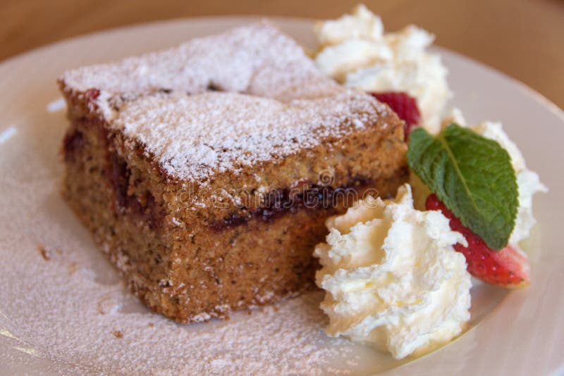 A piece of cake with cream stock photo. Image of gourmet - 66418040