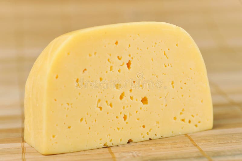 Piece of cheese stock image. Image of merchandise, swiss - 18560705