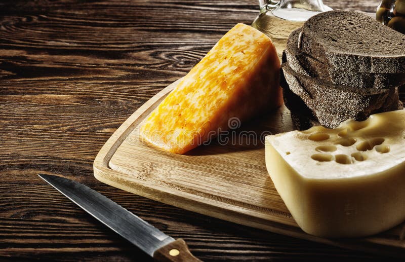 A Piece of Cheese and Bread on the Table Stock Photo - Image of closeup ...