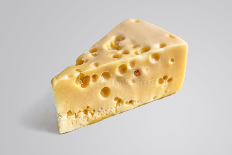 Piece of Cheese Triangular in Shape, with Large Holes Stock Image ...