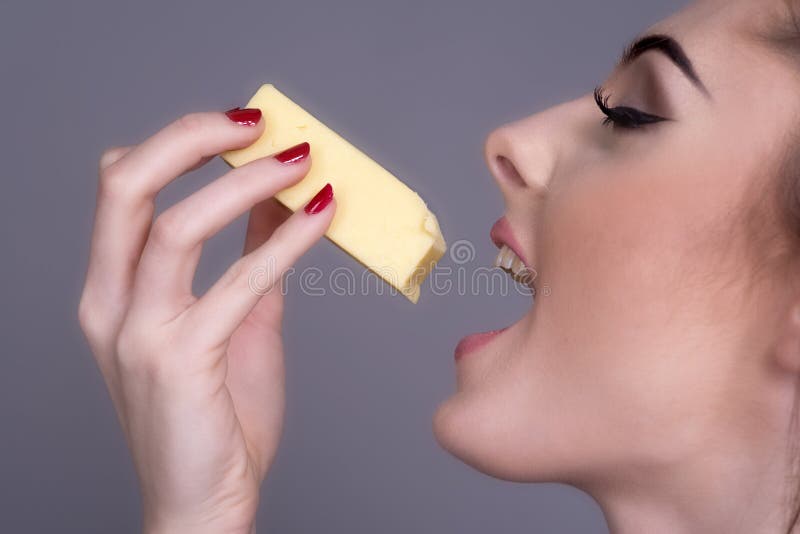 Piece of Cheese and Woman`s Open Mouth Stock Photo - Image of munching ...