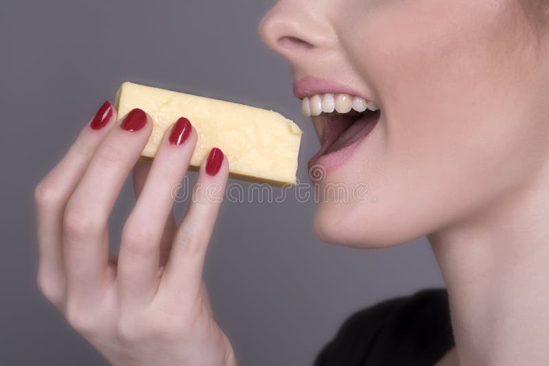Piece of Cheese and Woman`s Open Mouth Stock Image - Image of biiting ...