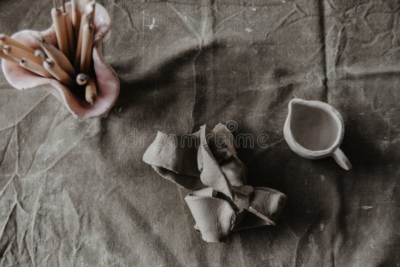 A Piece of Clay on Table. Handmade Craft Background Stock Image - Image ...