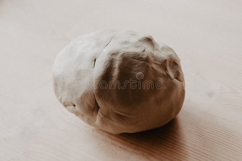 A Piece of Clay on Table on Wood Background Stock Photo - Image of ...