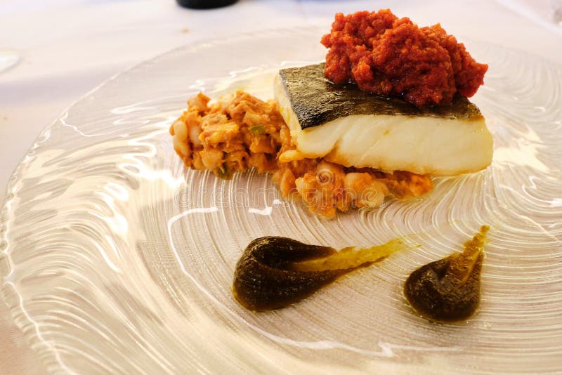 Piece of Cod with Skin and Vegetable Garnish Stock Photo - Image of ...