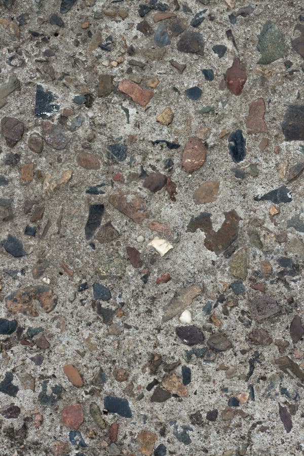 Mixed Pebbles in Concrete stock image. Image of variegated - 92192451