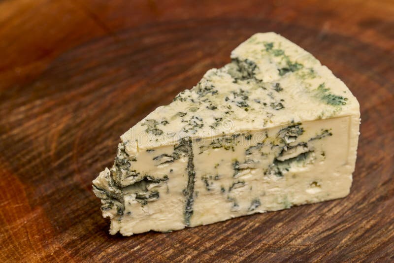 A Piece of Dorblu Cheese on a Wooden Stock Photo - Image of gorgonzola ...