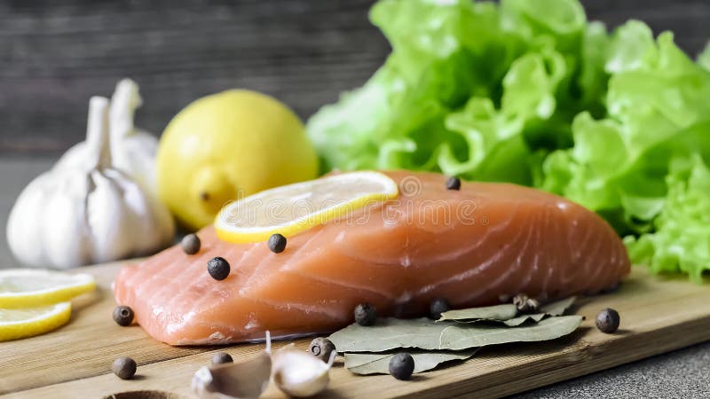A Piece of Fish with Vegetables on the Table. Healthy Food for L Stock ...
