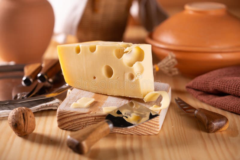 Piece of Fresh Tasty Cheese on the Kitchen Table Stock Photo - Image of ...