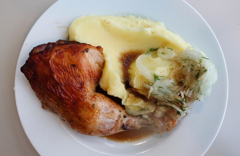 A Piece of Fried Chicken with Mashed Potatoes. Hearty Meal Stock Image ...
