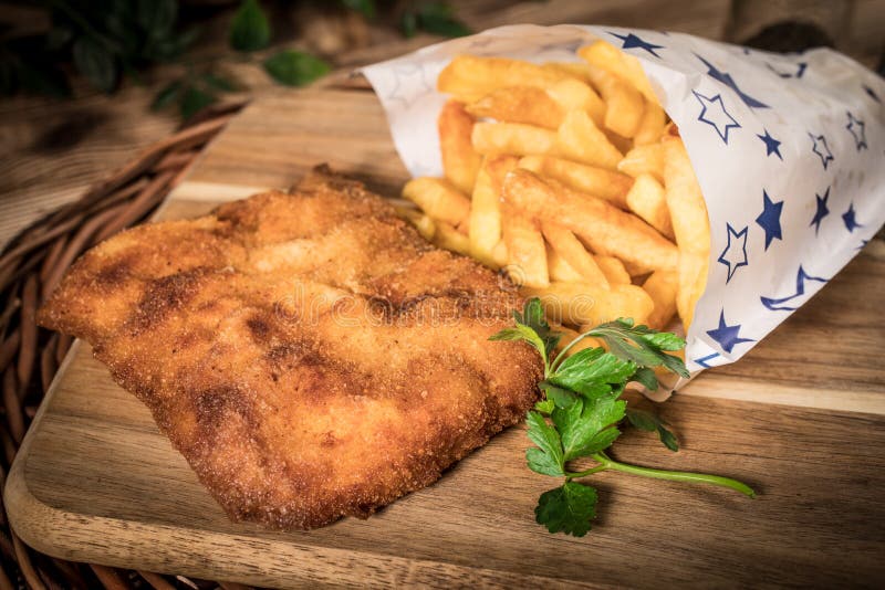 A Piece of Fried Cod with Fries on Cutting Board. Stock Image - Image ...