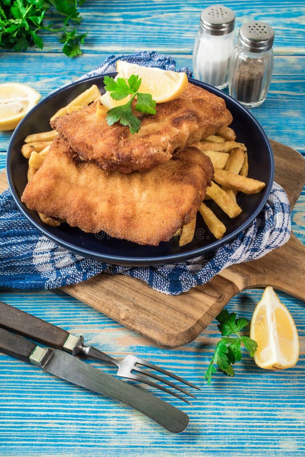 A Piece of Fried Cod with Fries Stock Image - Image of plate, parsley ...