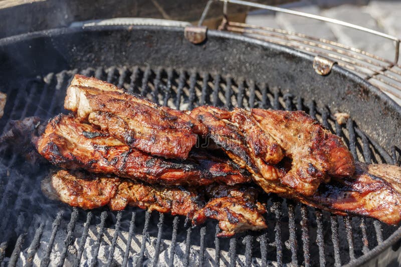 A Piece of Fried on the Fire Meat Lies on the Grill Stock Photo - Image ...