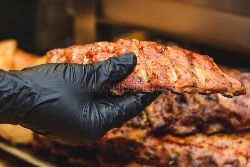 A Piece of Fried Meat in the Hands Stock Photo - Image of background ...