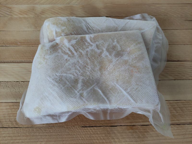Piece of Frozen Pork Lard in a Vacuum Packaging Stock Photo - Image of ...
