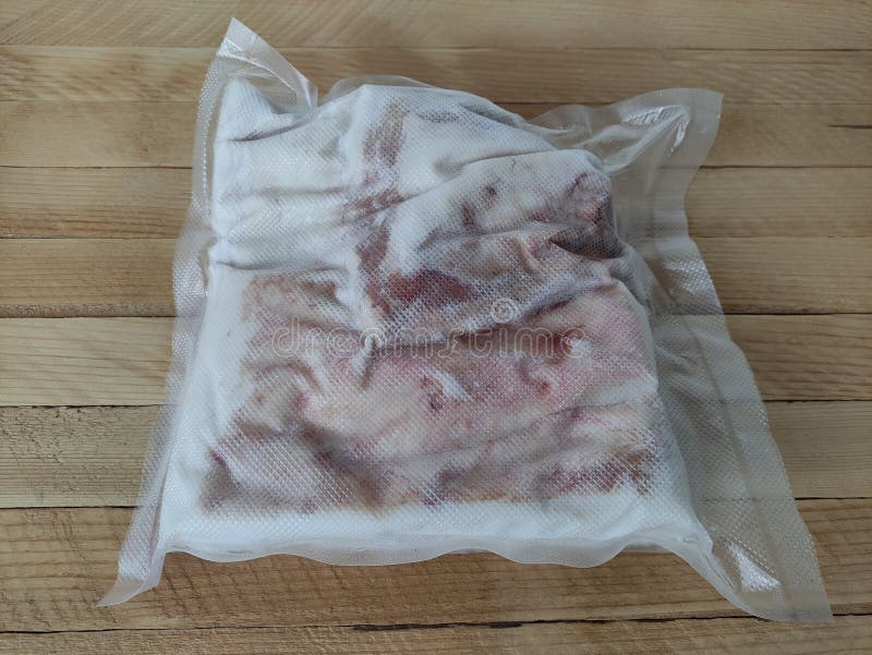 Piece of Frozen Pork Lard in a Vacuum Packaging Stock Photo - Image of ...