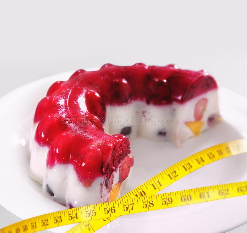Piece of a Fruit Jelly Cake with a Measuring Tape Stock Image - Image ...