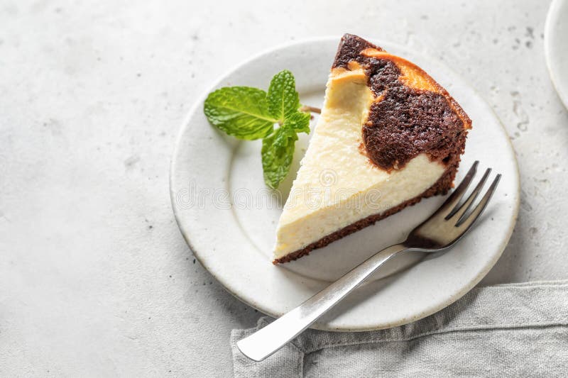 Piece of Homemade Chocolate Cheesecake with Mint Leave on a Plate on ...