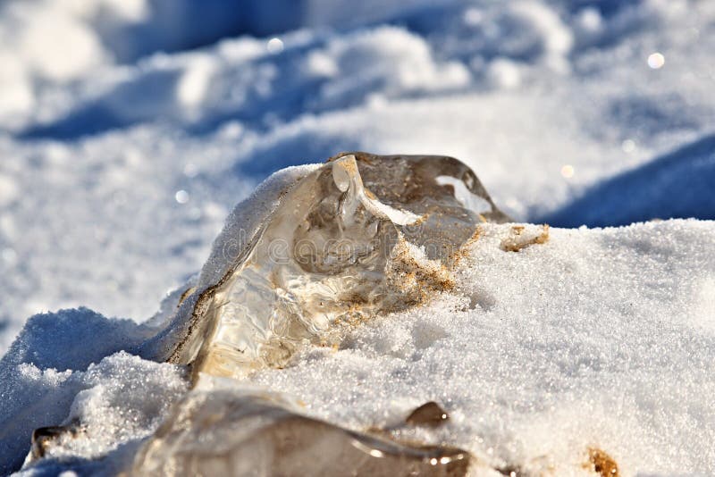 A piece of ice stock photo. Image of conceal, lays, sand - 12231762