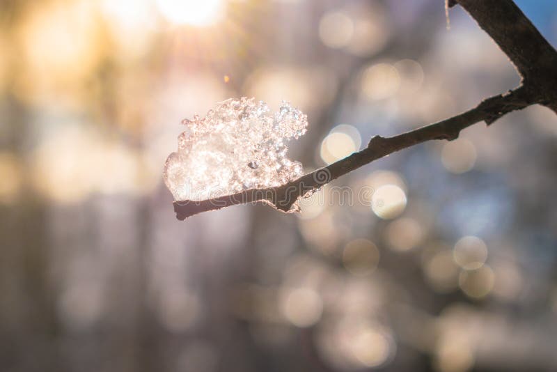 Sun Rays Melting the Snow on Top of a Mountain Stock Photo - Image of ...