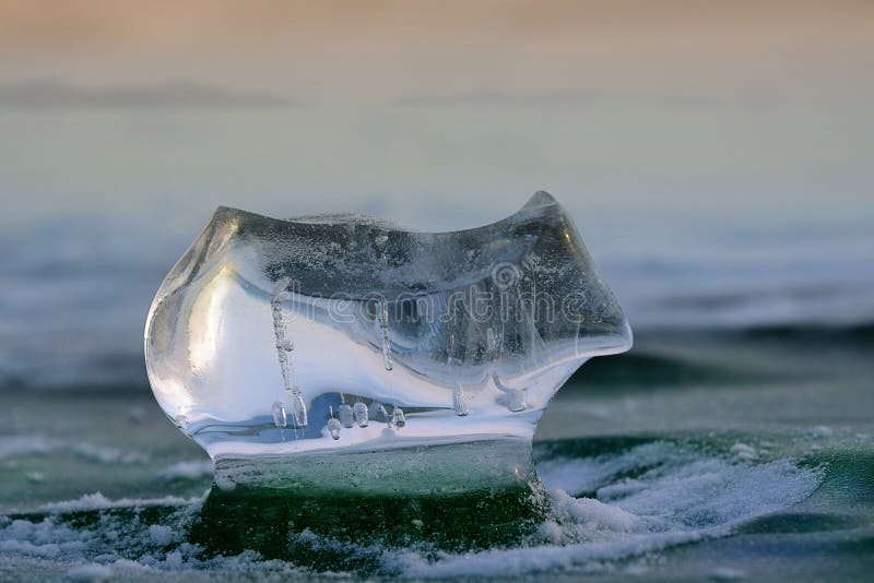 Piece of Ice in Rays of Sun Stock Photo - Image of huge, horizontal ...
