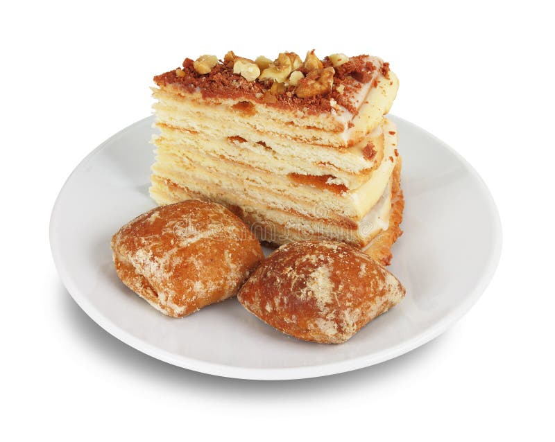 Piece of Cake and Two Ginger Breads on White Saucer Stock Image - Image ...