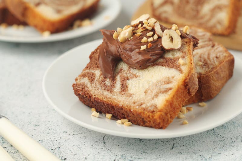 A Piece of Marble Biscuit with Chocolate Cream and Nuts Stock Image ...