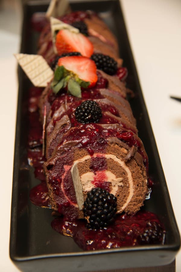 Piece of Mini Chocolate Log Cake with Strawberry Stock Photo - Image of ...