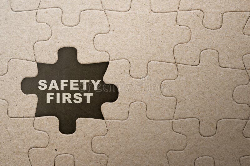 Piece of Missing Jigsaw Puzzle with Safety First Text Stock Image ...