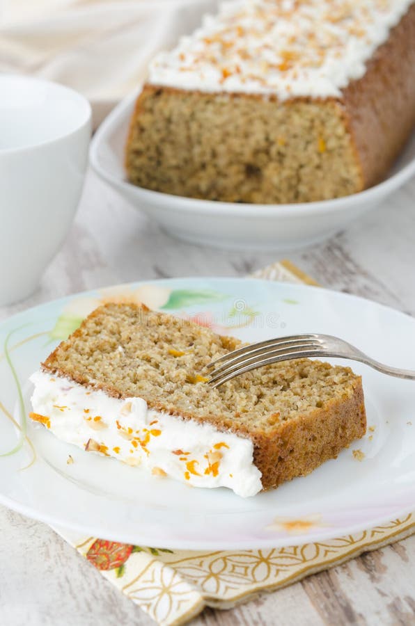 Piece of Orange Cake and Cake in the Background Stock Photo - Image of ...