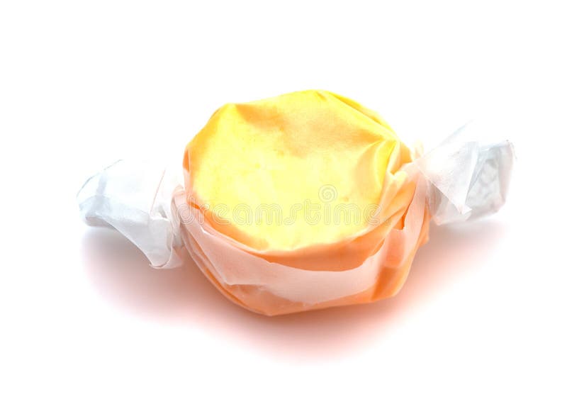 Piece of Orange Salt Water Taffy on a White Background Stock Photo ...